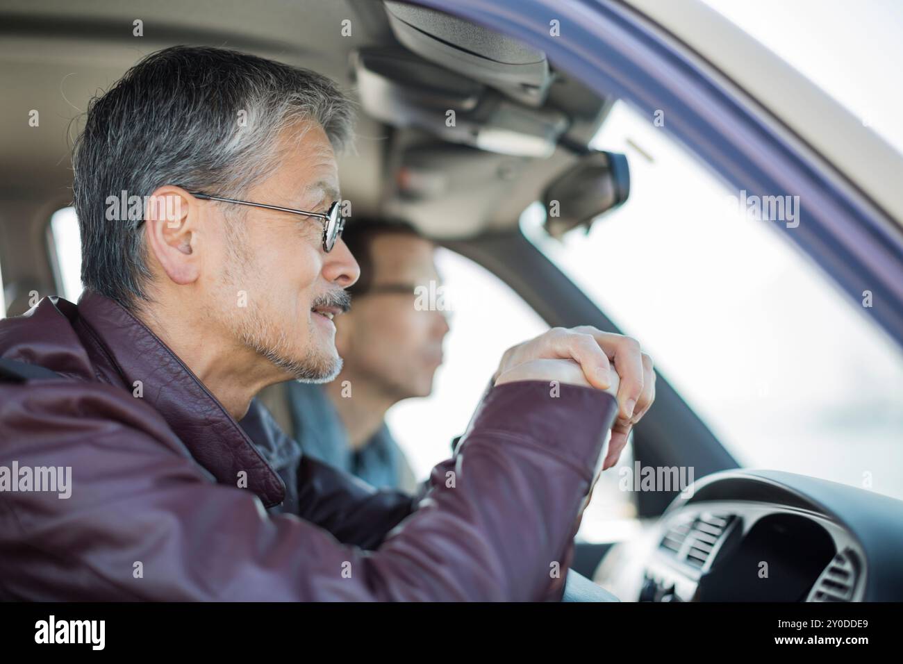 Driving senior man Stock Photo - Alamy