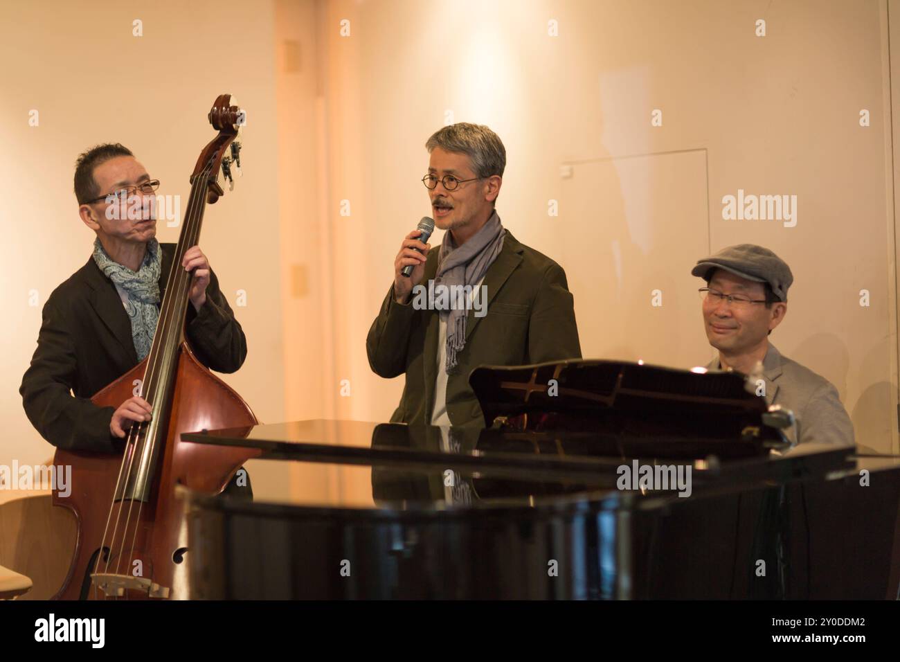 An elderly man playing an instrument Stock Photo - Alamy