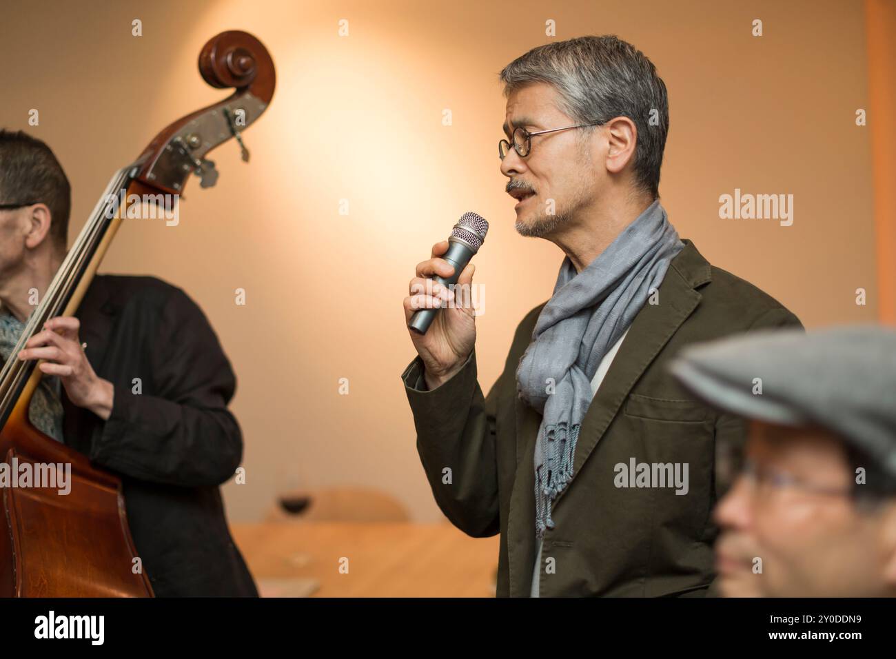 An elderly man singing a song Stock Photo - Alamy