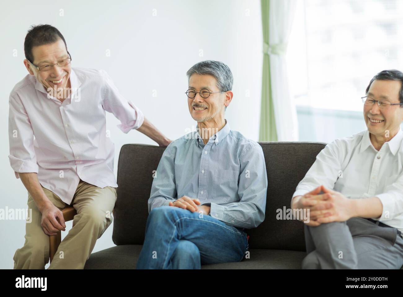 Elderly men having a conversation Stock Photo - Alamy