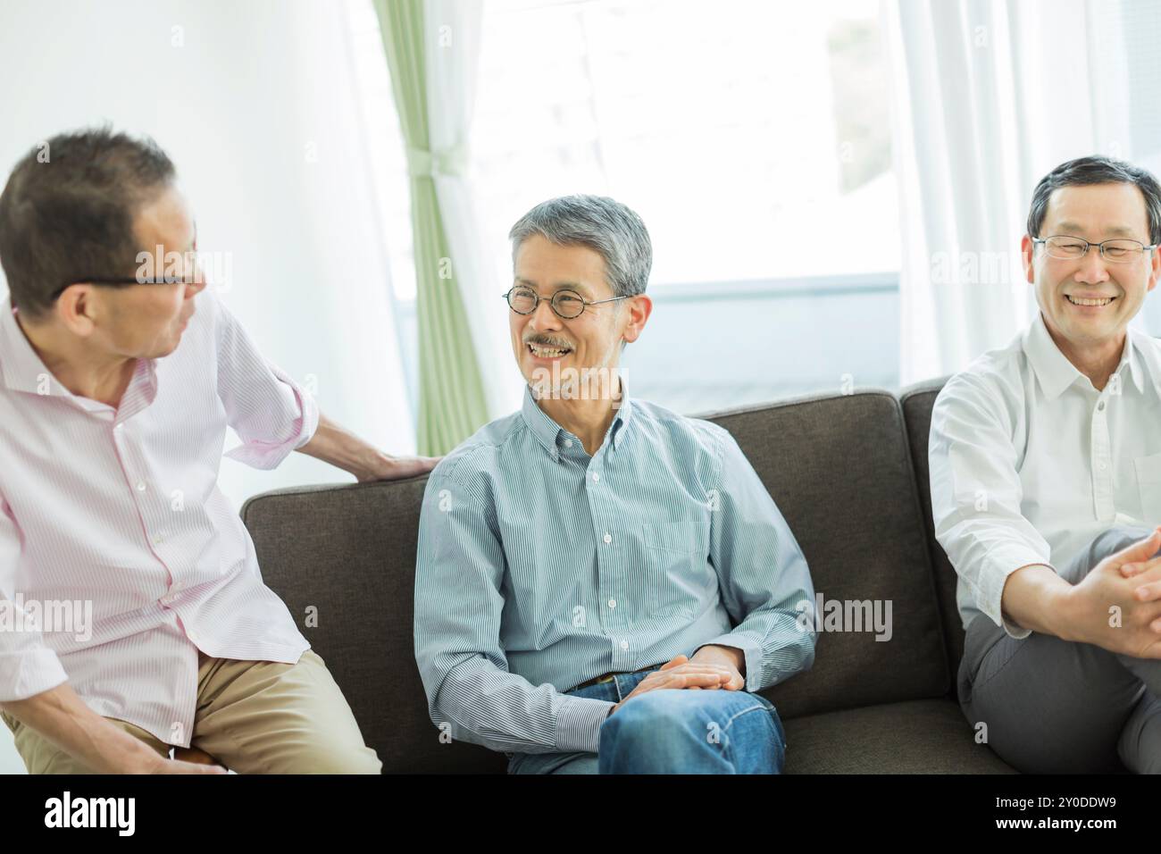Elderly men having a conversation Stock Photo - Alamy