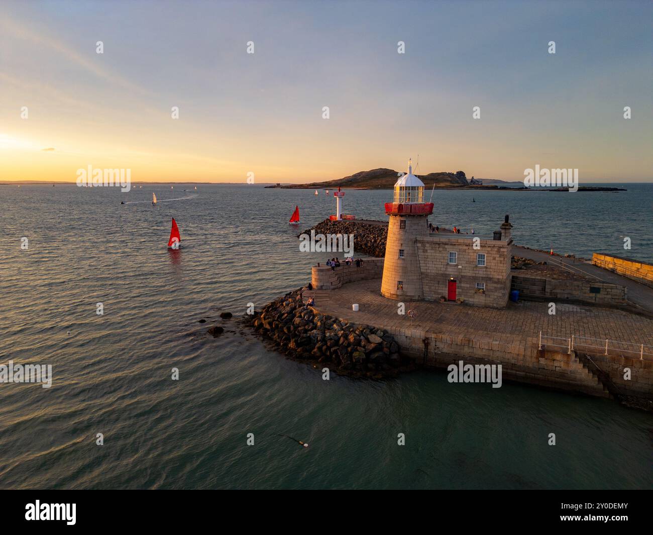 Golden hour at Howth Lighthouse Stock Photo - Alamy