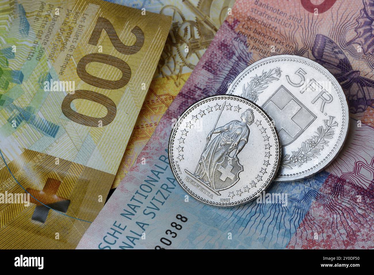 Swiss coins on banknotes, Switzerland, Europe Stock Photo - Alamy