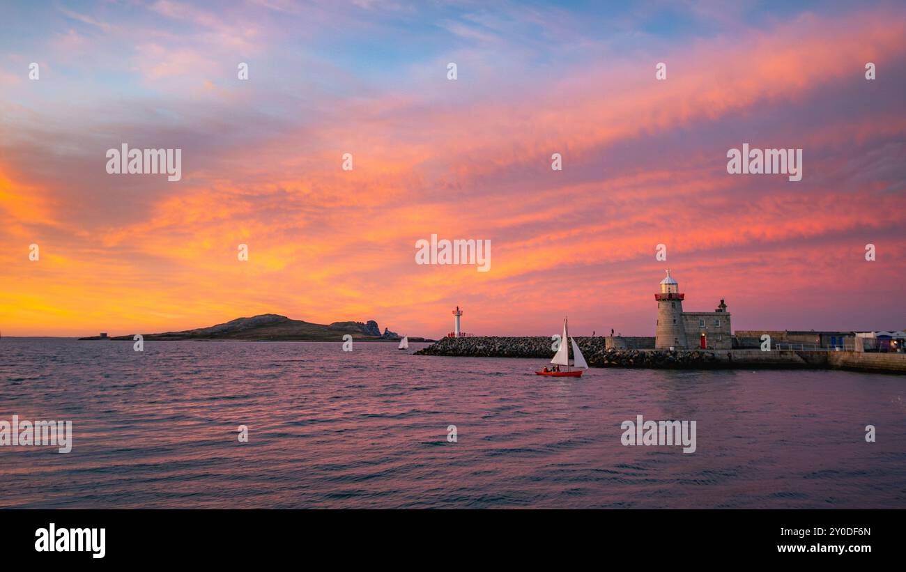 Colourful sunset sky over Ireland's Eye and Howth pier Stock Photo - Alamy