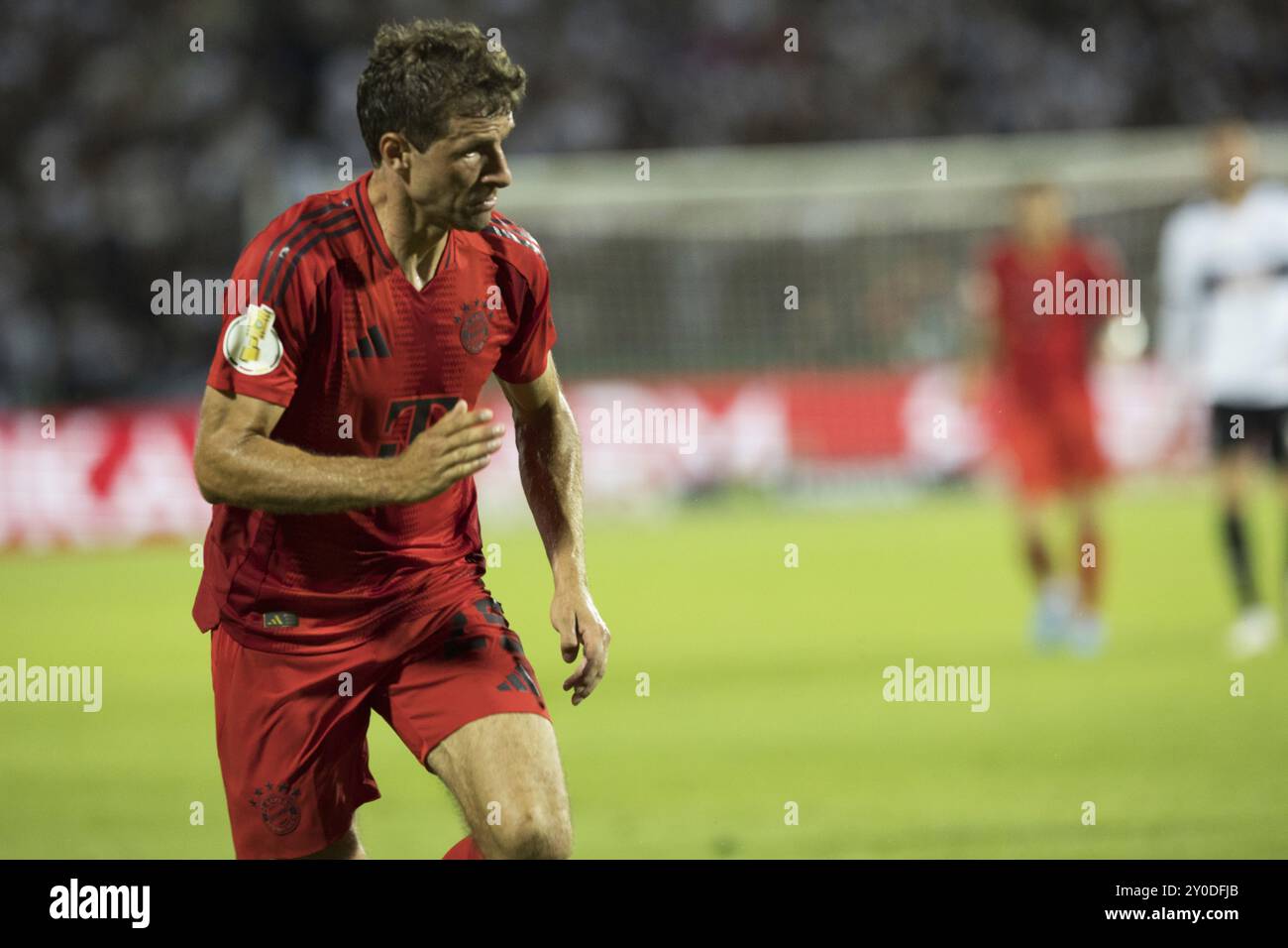 Football match, Thomas MUeLLER FC Bayern Munich on the run, football ...