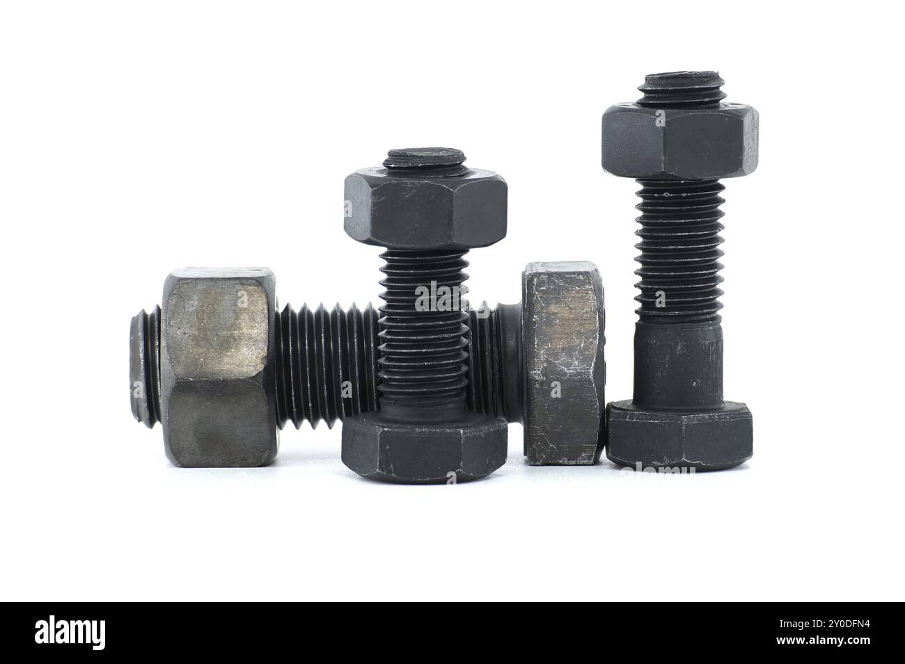 Orderly arrangement of dark-colored metal of hex bolts and nuts include ...