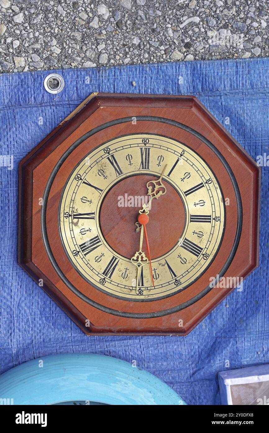 Octagonal wall clock with wood Stock Photo - Alamy