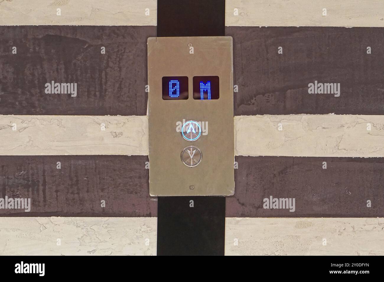 Modern lift call buttons with display Stock Photo - Alamy