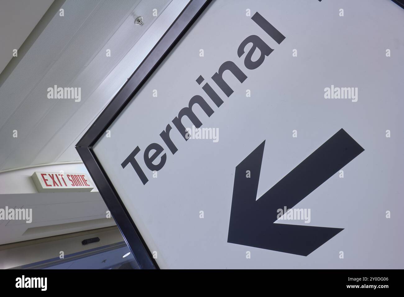 Signpost at the airport pointing towards the terminal, Toronto Airport ...