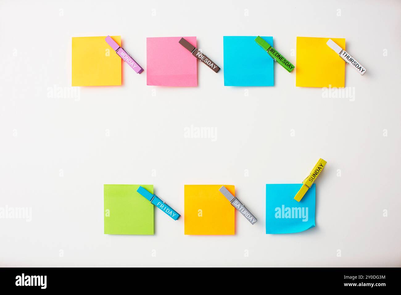 Days of week attached to the board with a clip and sticky notes Stock ...