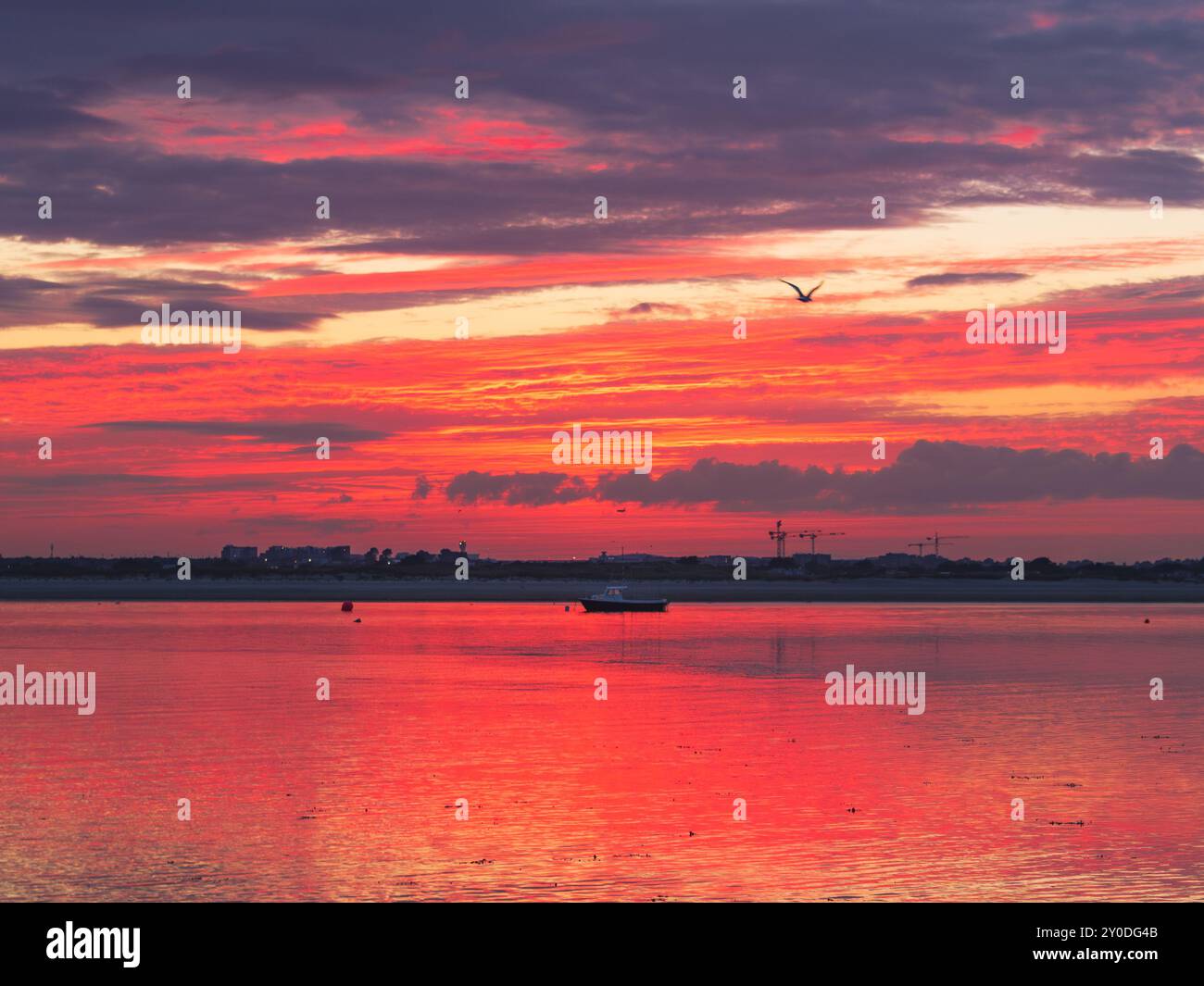 Red sunset sky at Sutton Strand Stock Photo - Alamy