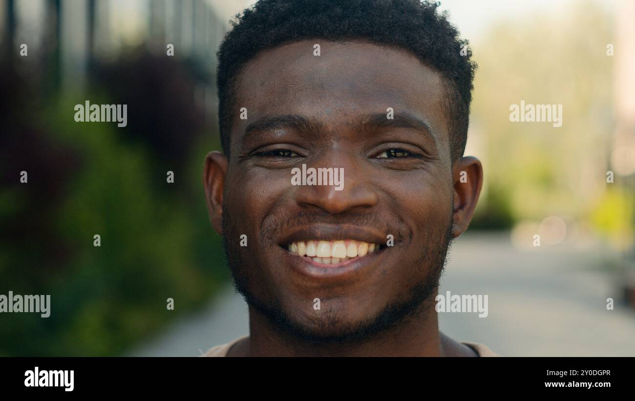 Closeup headshot African American cheerful positive happy smiling guy ...