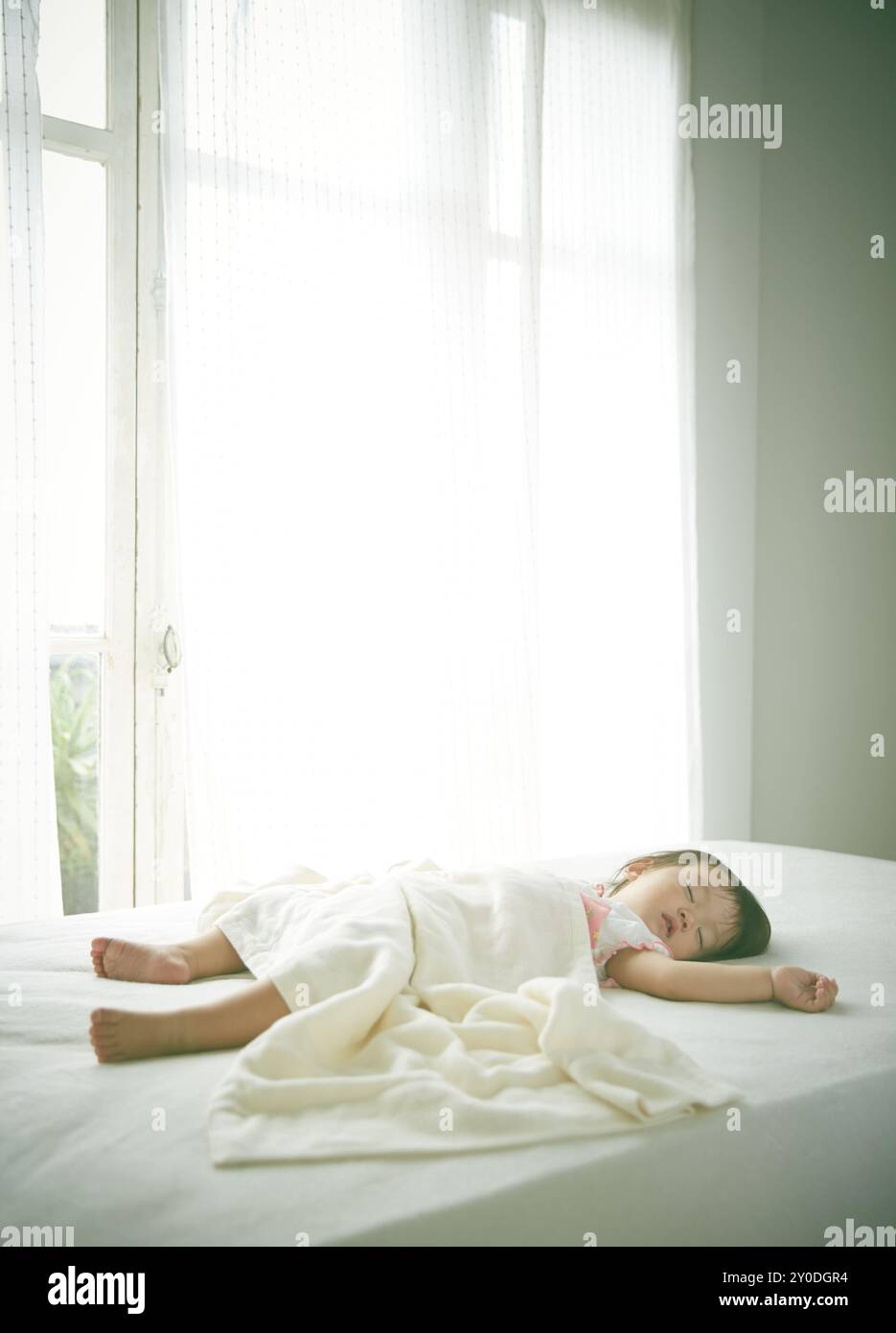 Baby taking a nap Stock Photo - Alamy