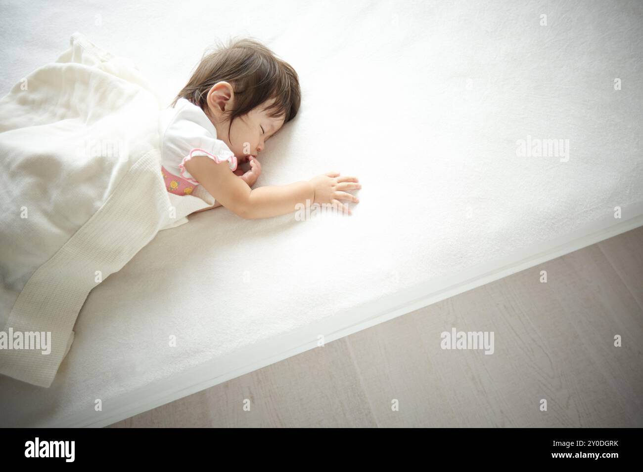 Baby taking a nap Stock Photo - Alamy