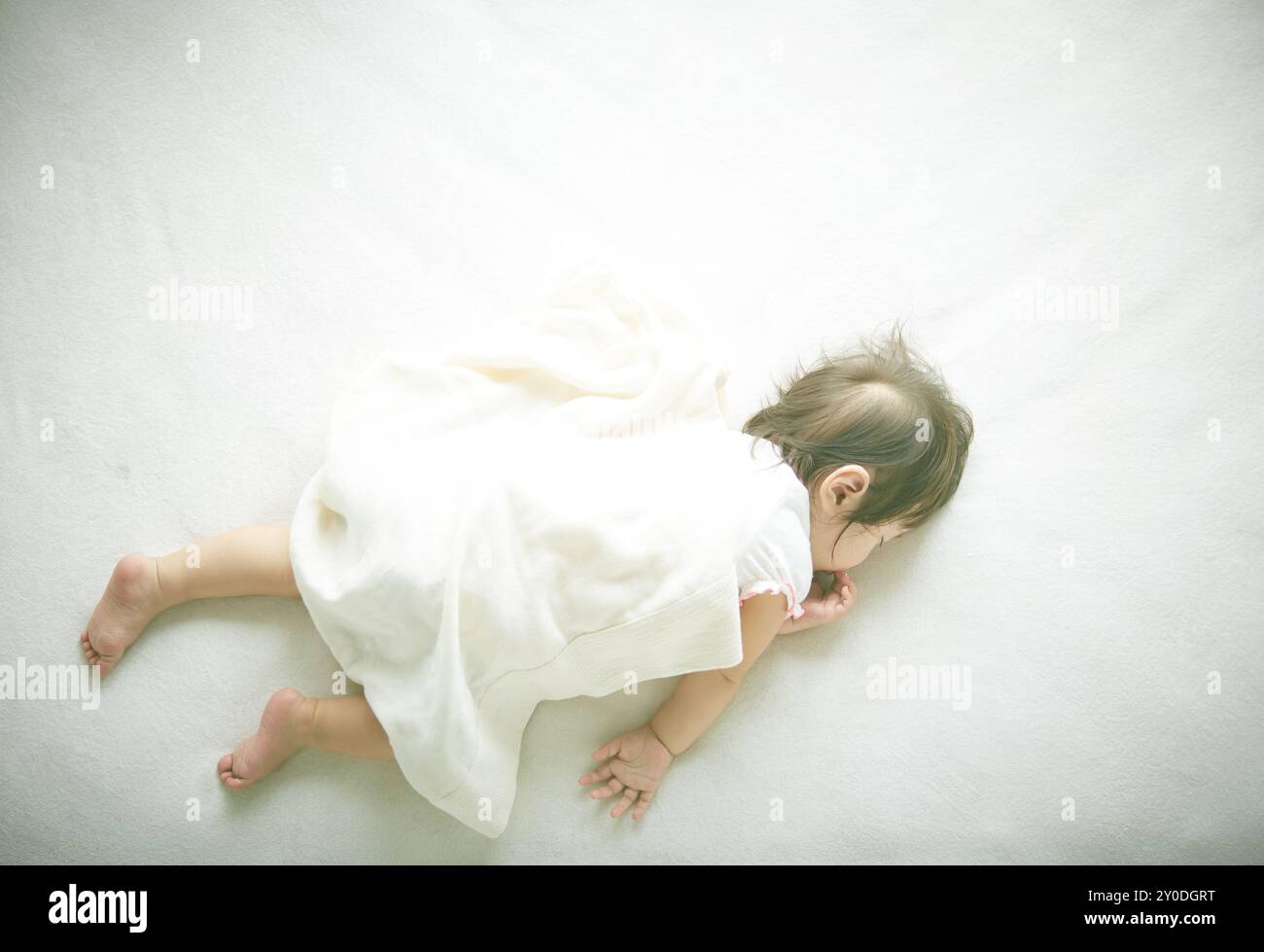 Baby taking a nap Stock Photo - Alamy