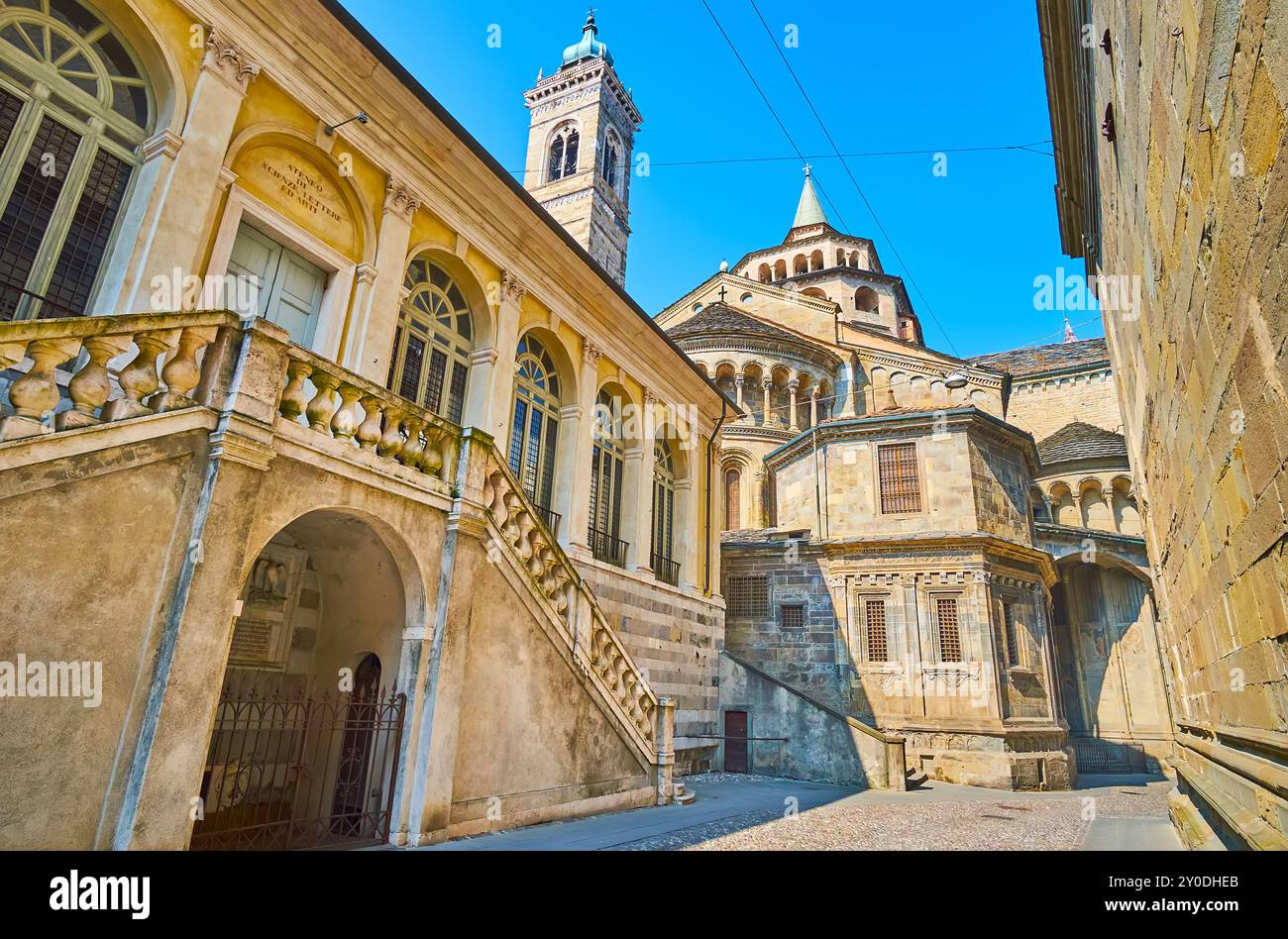 The medieval stone Visconti Fountain and Basilica of Santa Maria ...