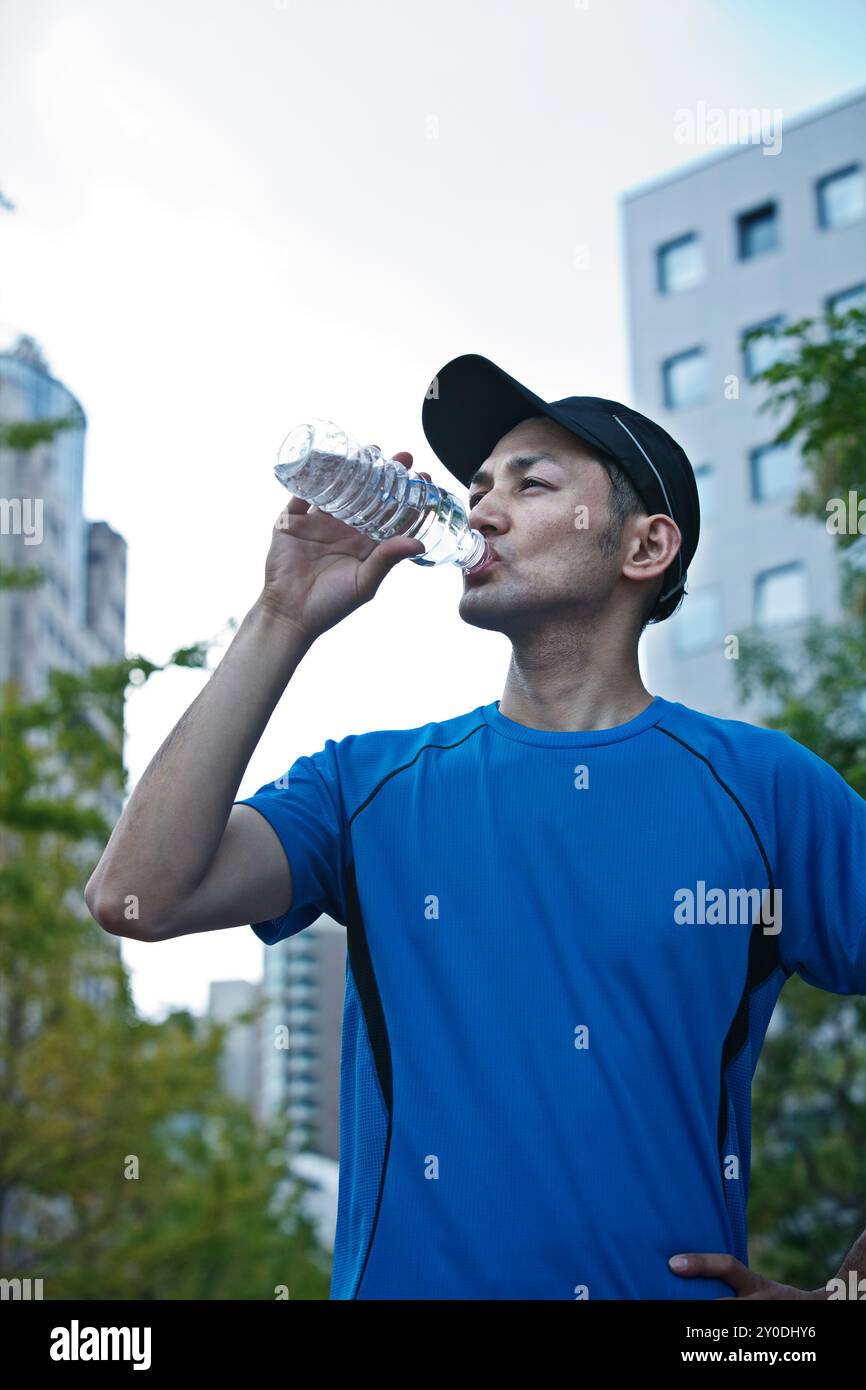 A man drinking water Stock Photo - Alamy