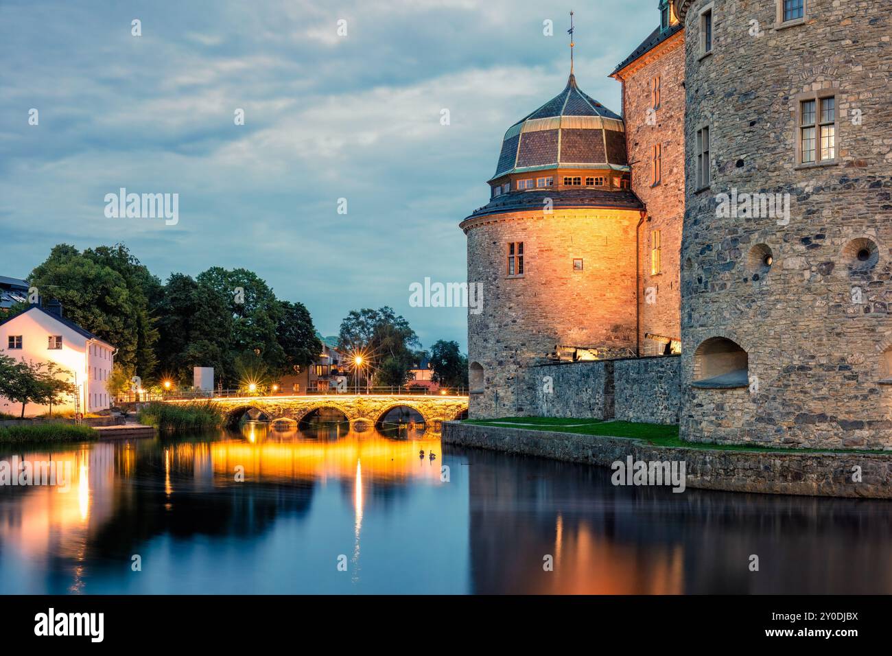 Bright illuminated medieval Orebro Castle is a fortification at Svartan ...