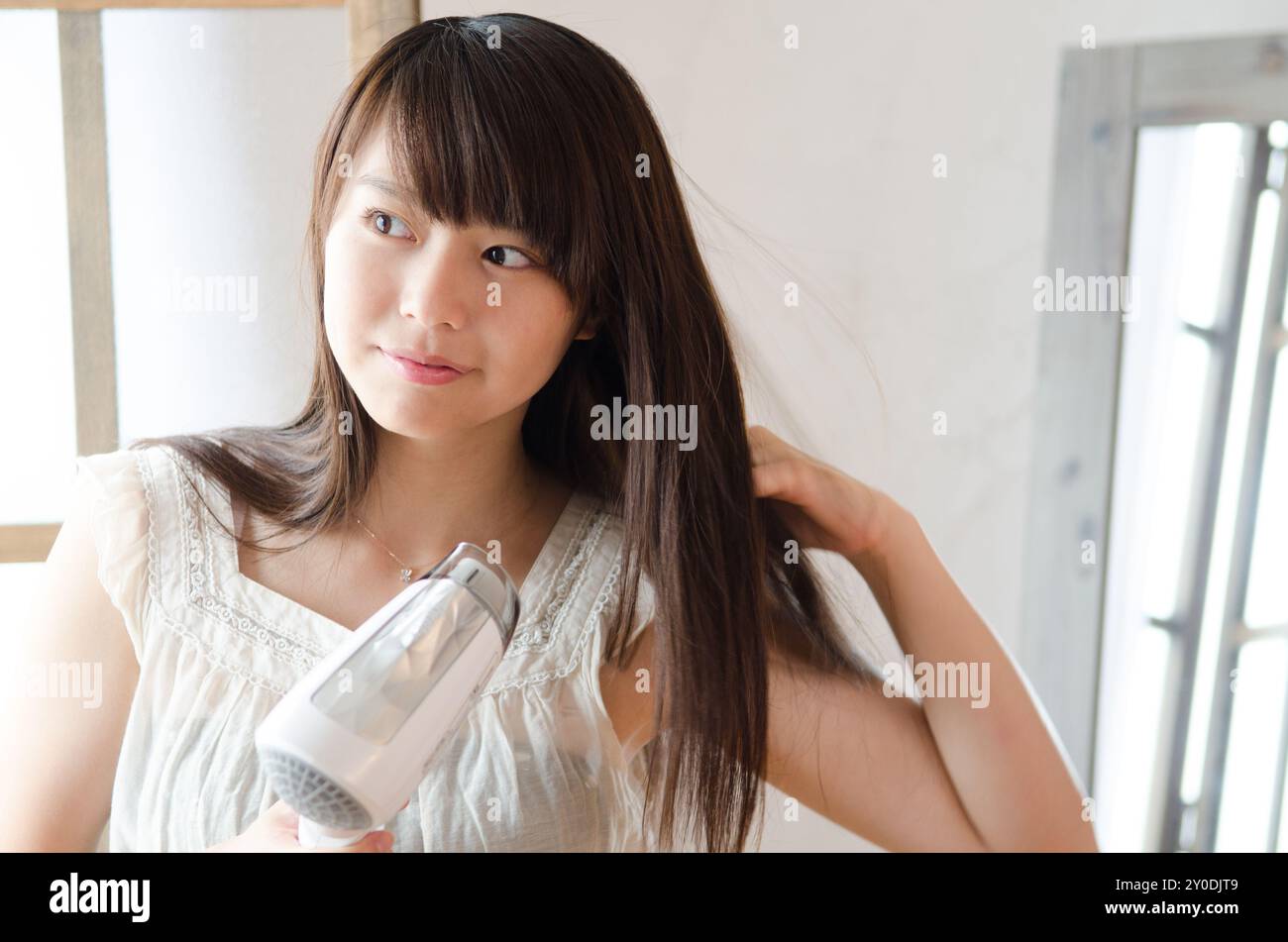 Woman getting ready indoor hi-res stock photography and images - Alamy