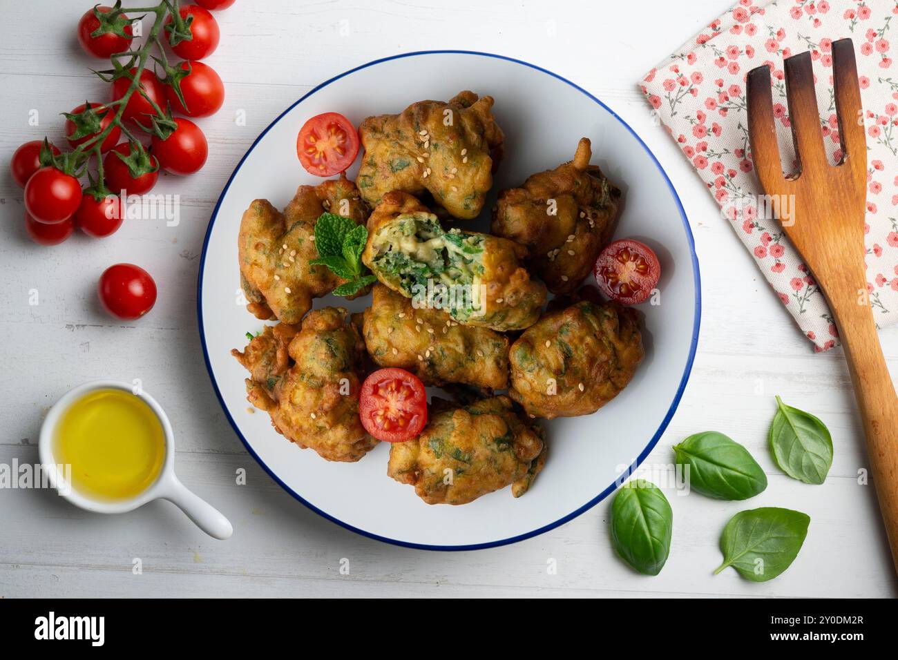 Spinach fritters, traditional Spanish tapa. Top view table Stock Photo ...