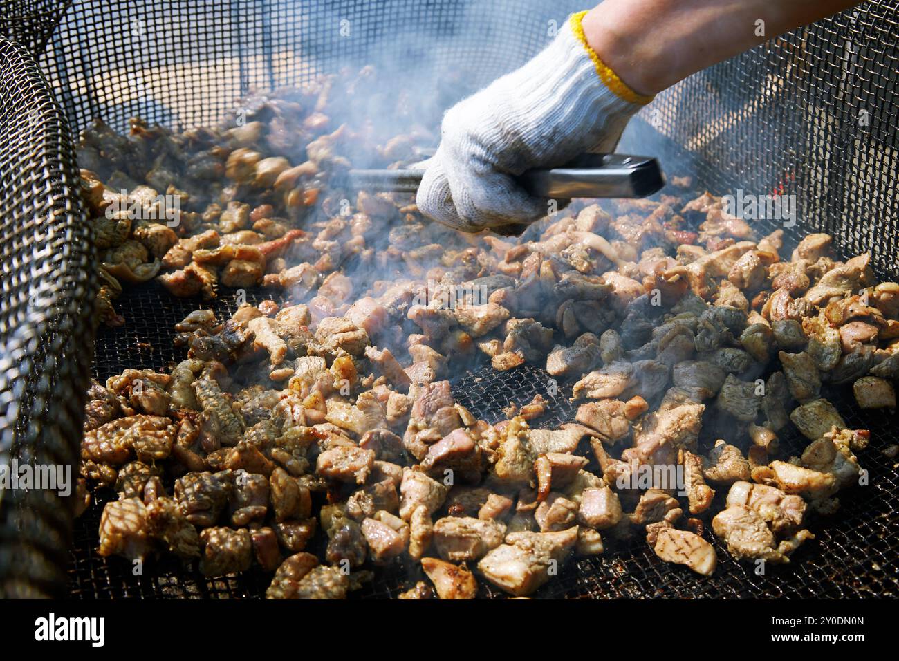 Free range chicken being charcoal grilled Stock Photo - Alamy