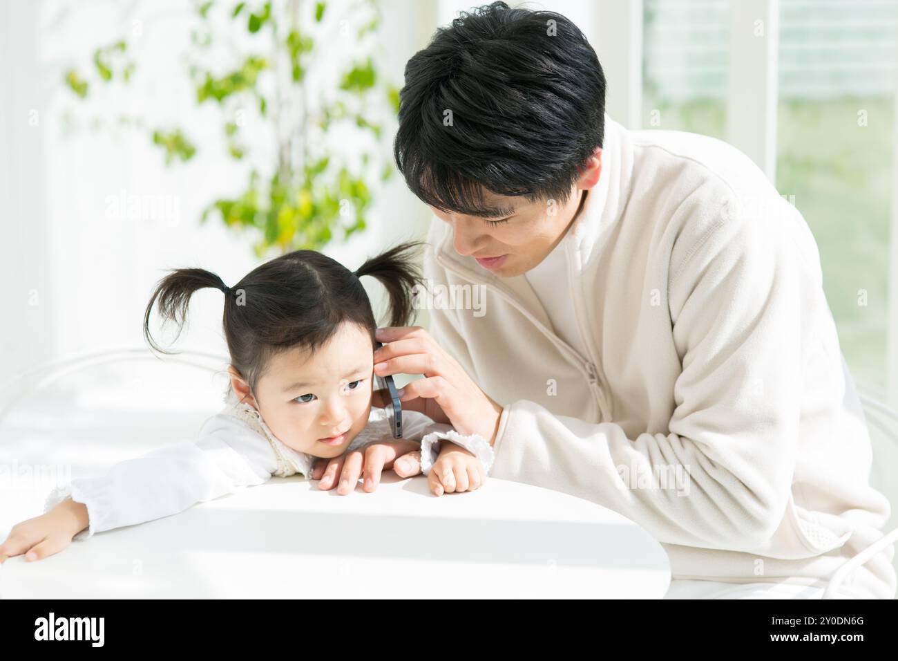 A smiling father and his daughter Stock Photo - Alamy