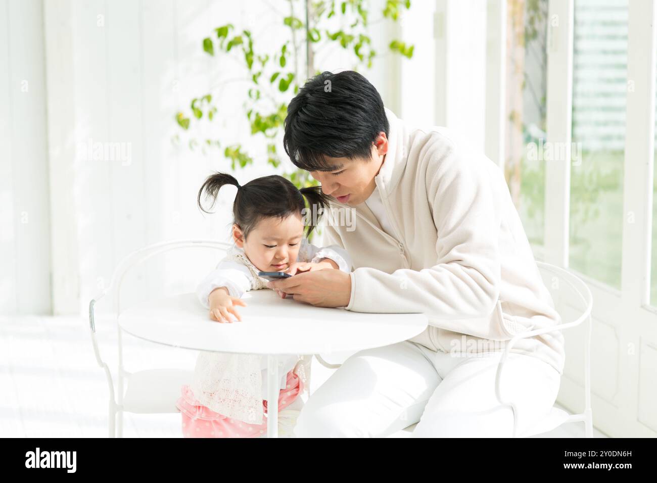 A smiling father and his daughter Stock Photo - Alamy