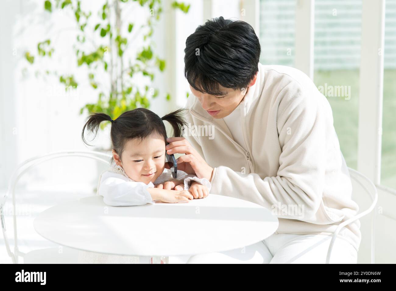 A smiling father and his daughter Stock Photo - Alamy