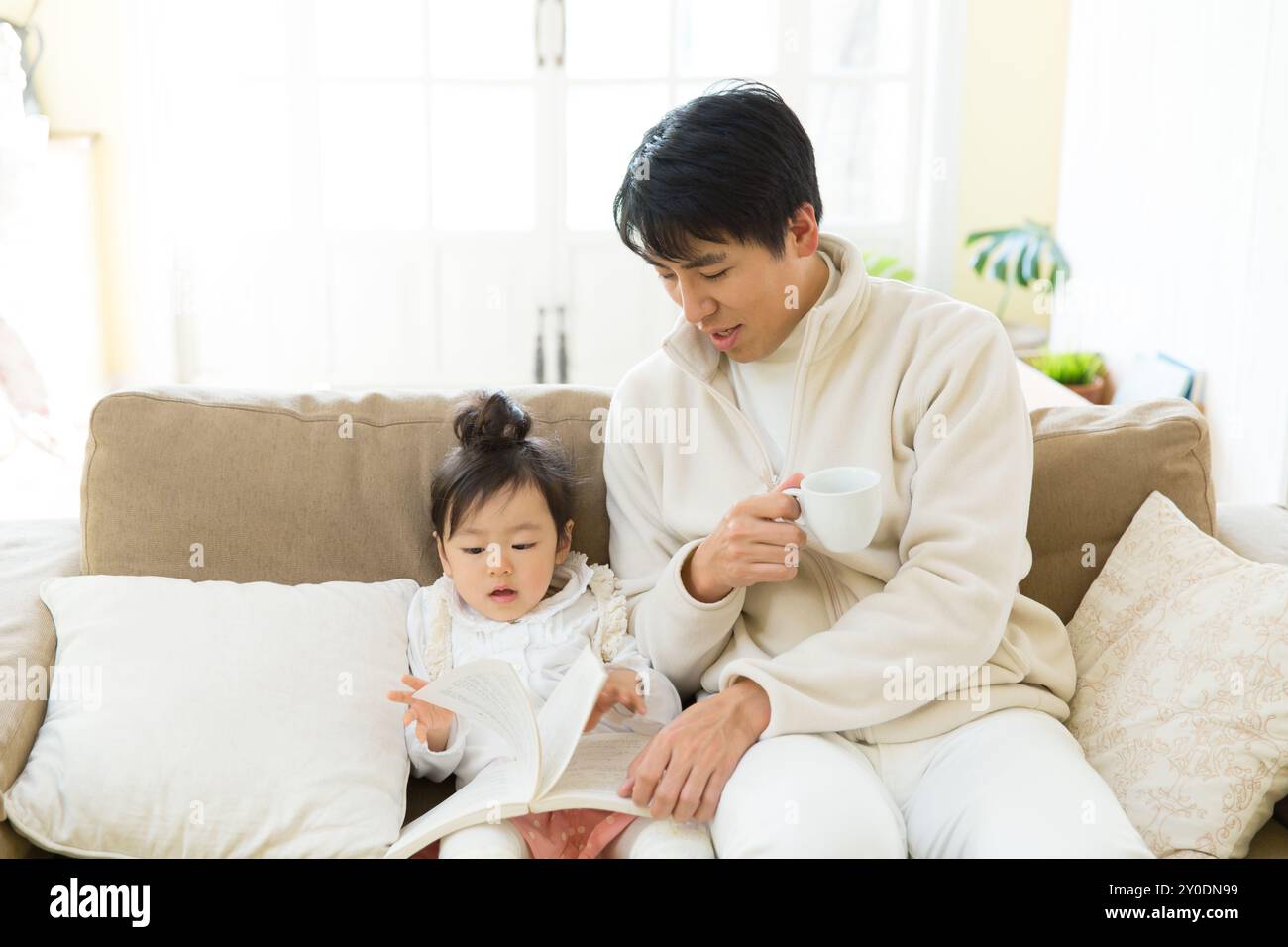 A smiling father and his daughter Stock Photo - Alamy