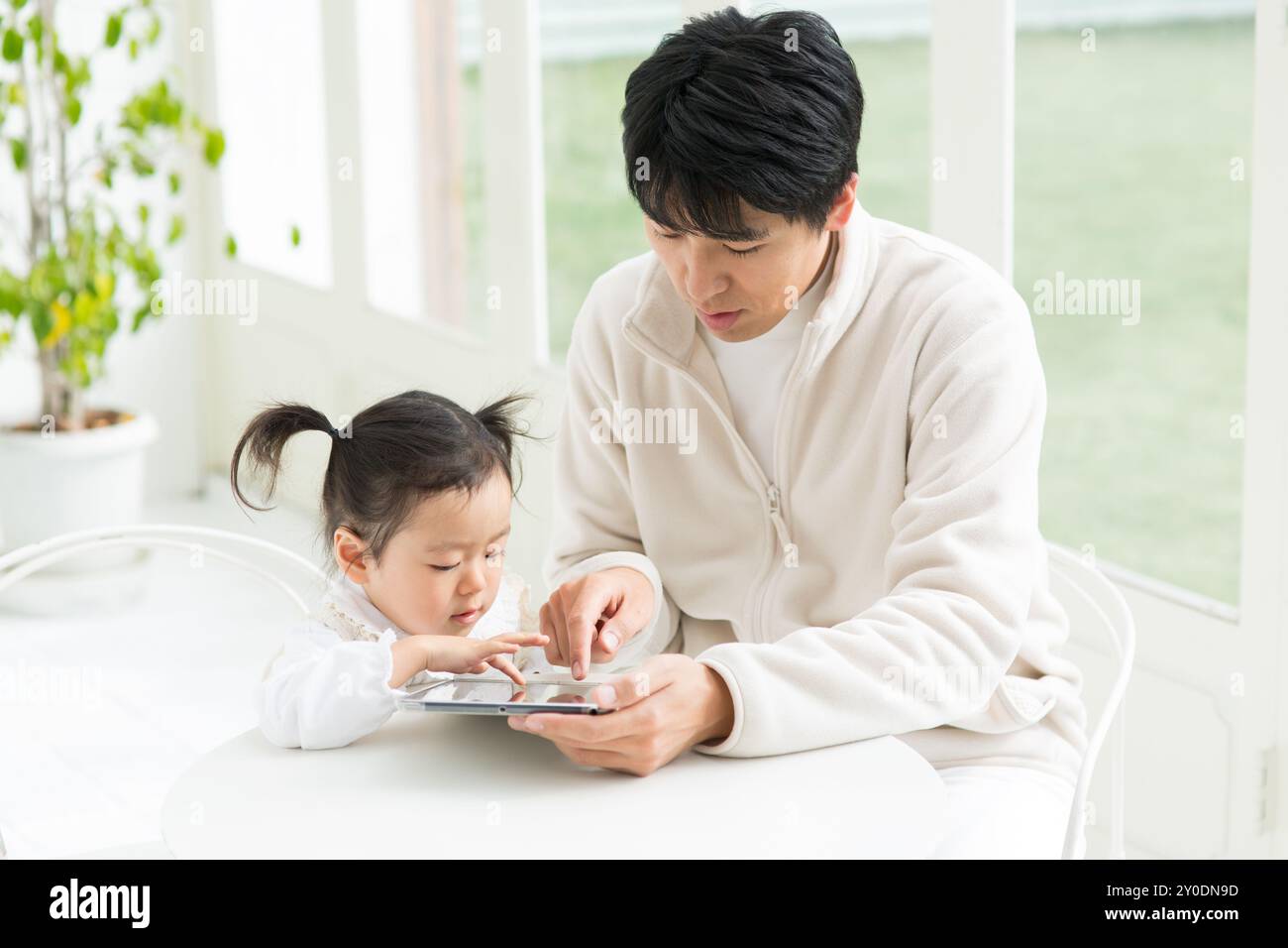 A smiling father and his daughter Stock Photo - Alamy