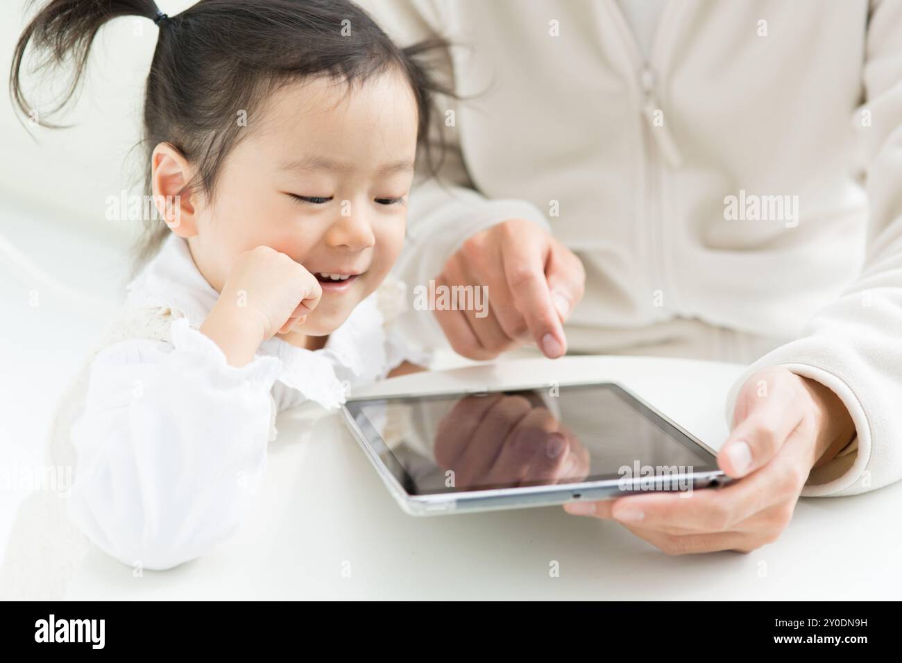 A smiling father and his daughter Stock Photo - Alamy