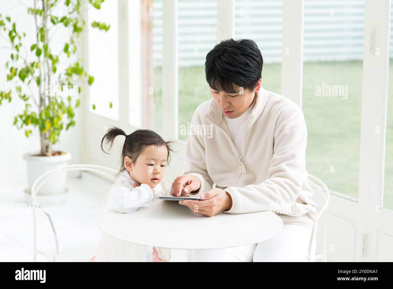 A smiling father and his daughter Stock Photo - Alamy