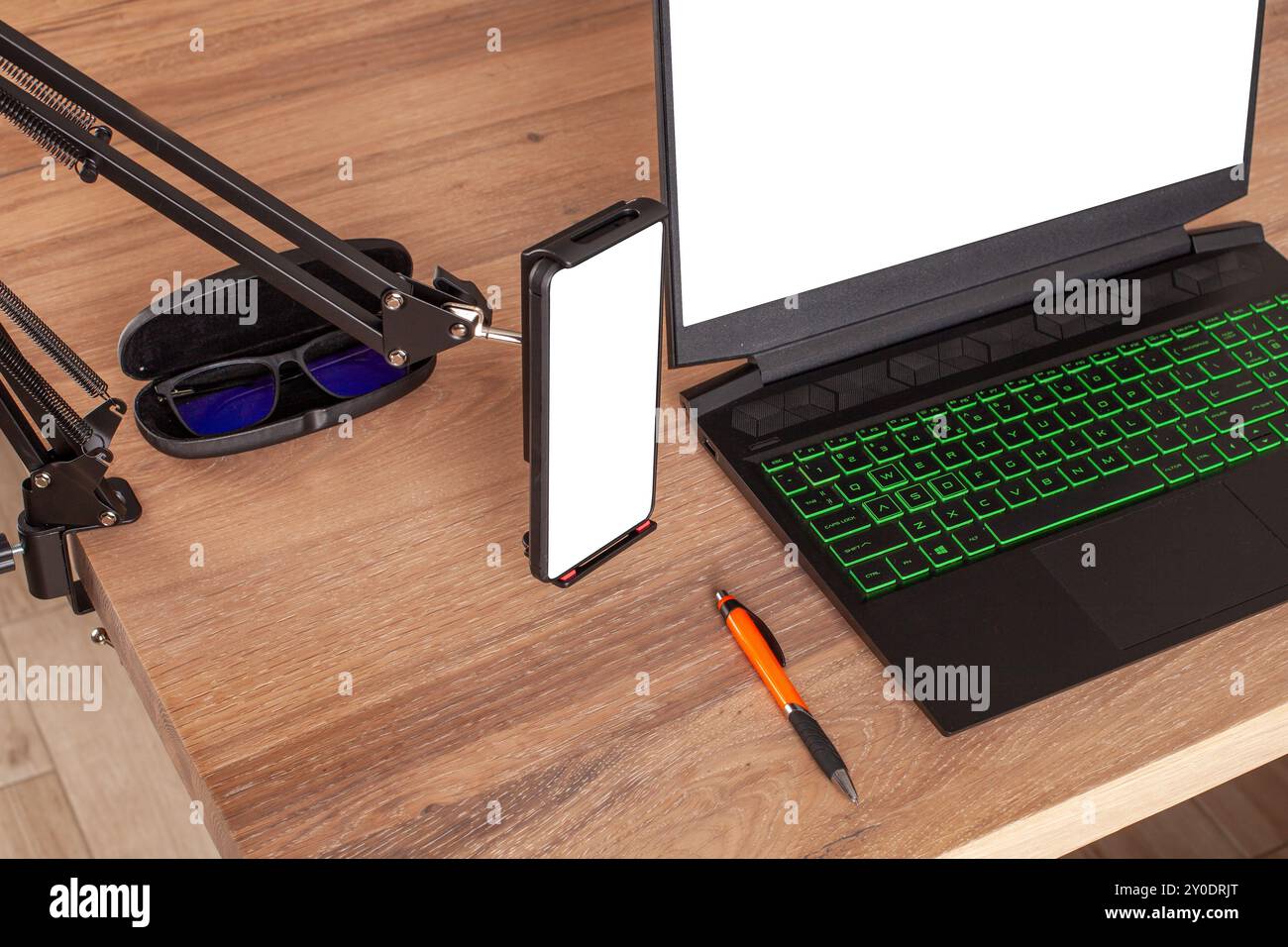 Workstation with Laptop and Phone Holder Stock Photo - Alamy