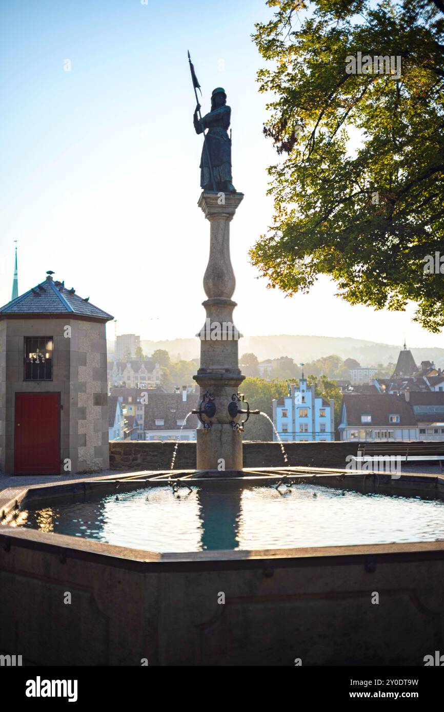 Old, vintage, tall drinking water fountain in Zurich, Switzerland. Wide ...