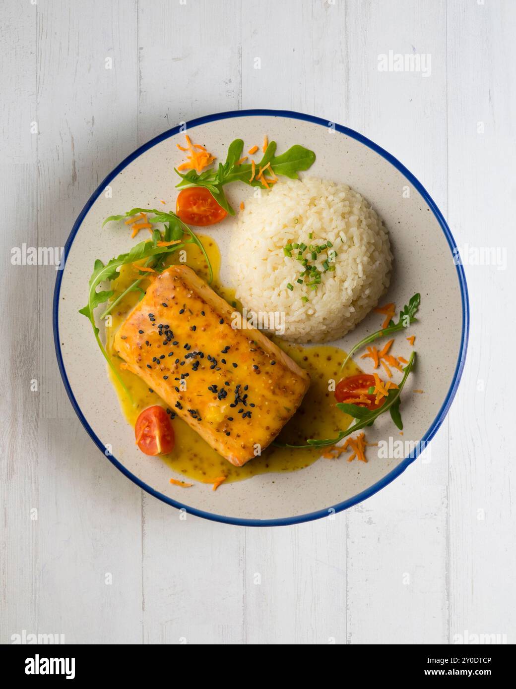 Baked salmon with orange sauce. Top view table with decoration Stock ...