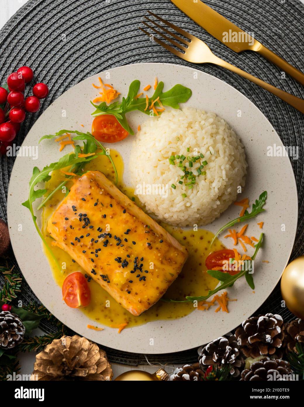 Baked salmon with orange sauce. Top view table with Christmas ...