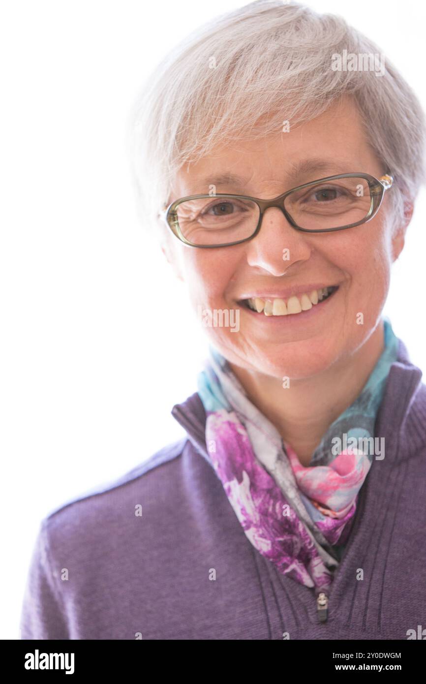 A smiling caucasian woman in her sixties Stock Photo - Alamy