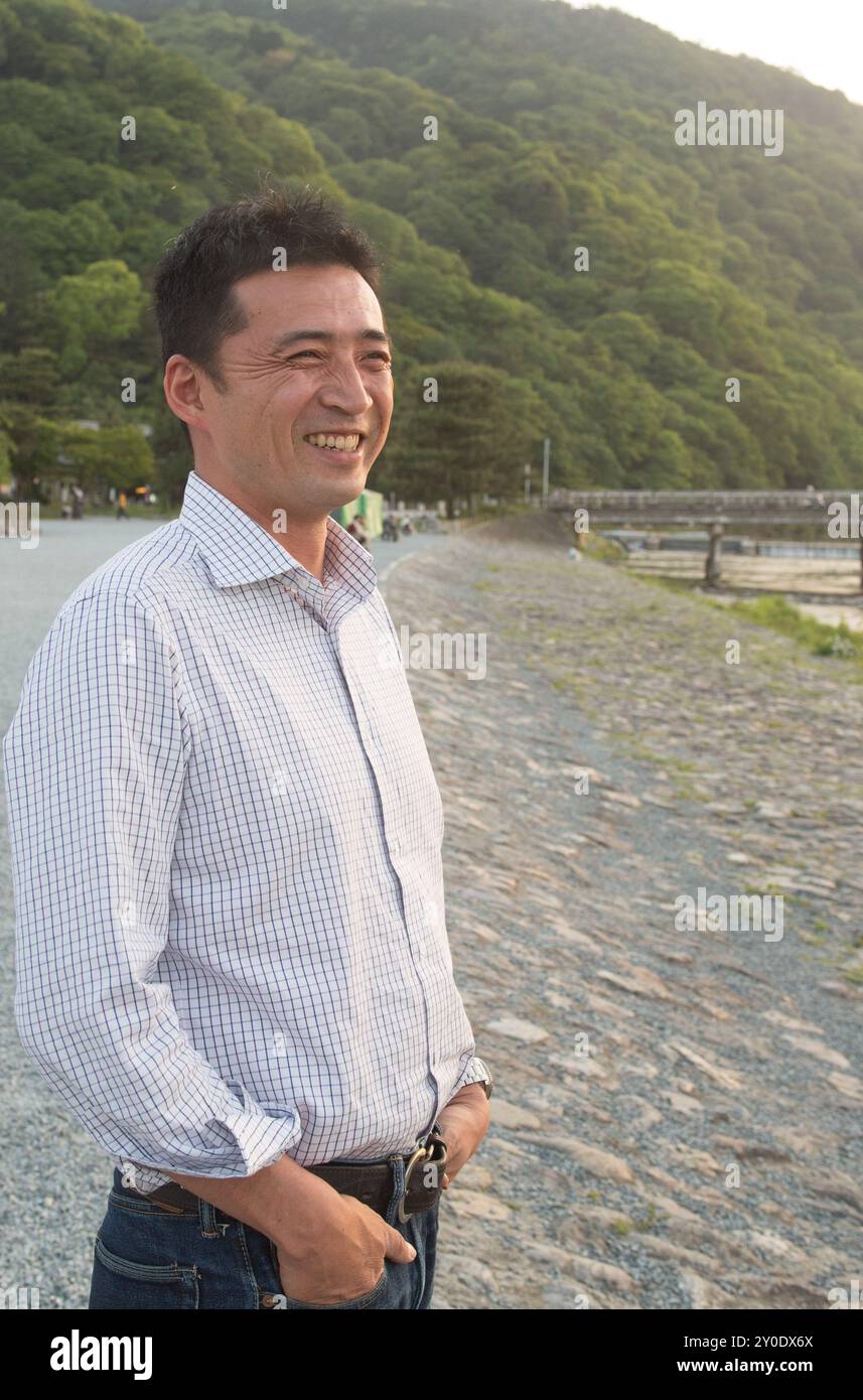 Middle aged man walking alone hi-res stock photography and images - Alamy