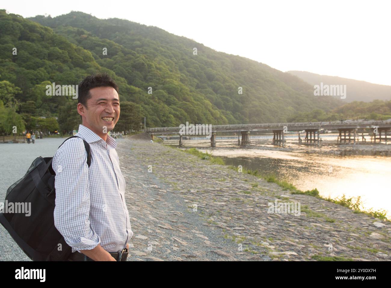 A middle aged man walking in Arashiyama Stock Photo - Alamy