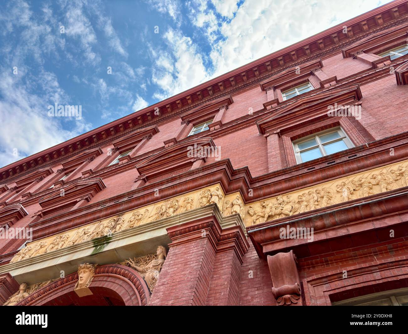 Arch & brick facade of the National Building Museum in Washington, DC ...