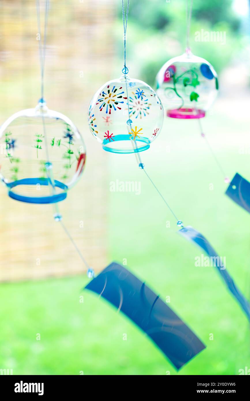 A wind chime and a reed screen Stock Photo - Alamy