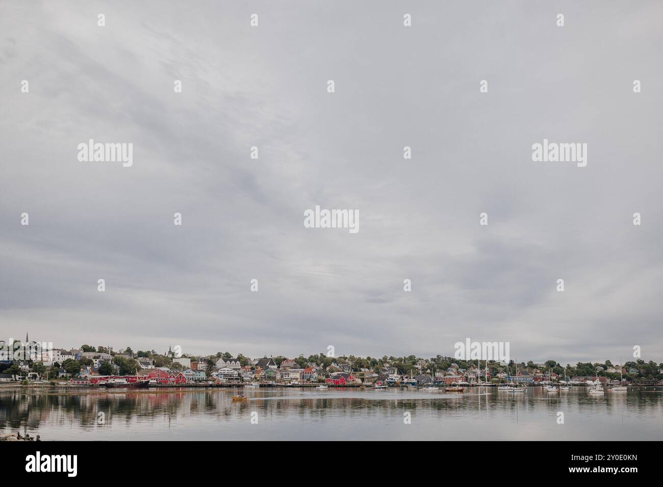 A yellow dory paddling in the Lunenburg harbour Stock Photo - Alamy