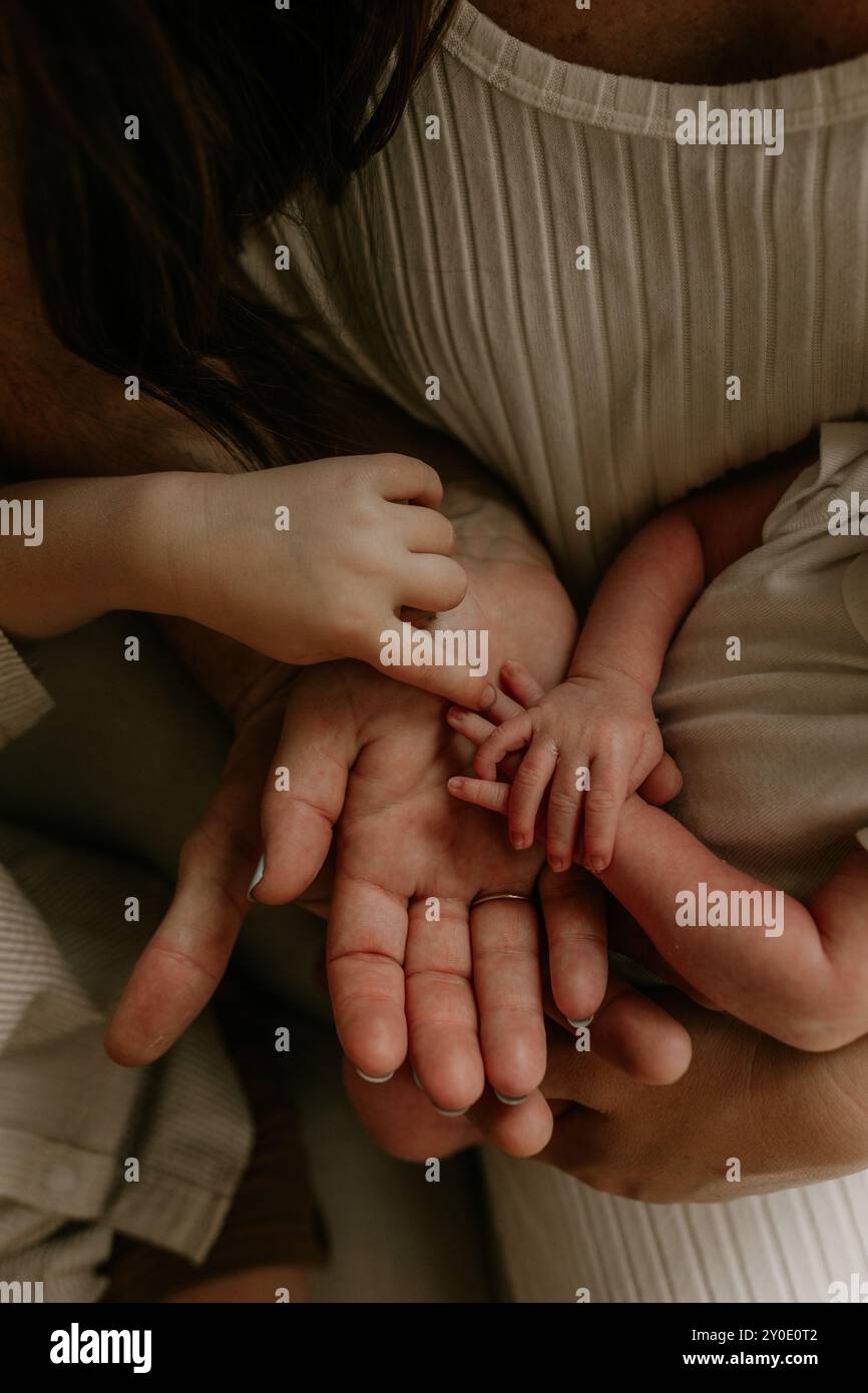 Family Hands: A Touching Portrait of Connection Stock Photo - Alamy
