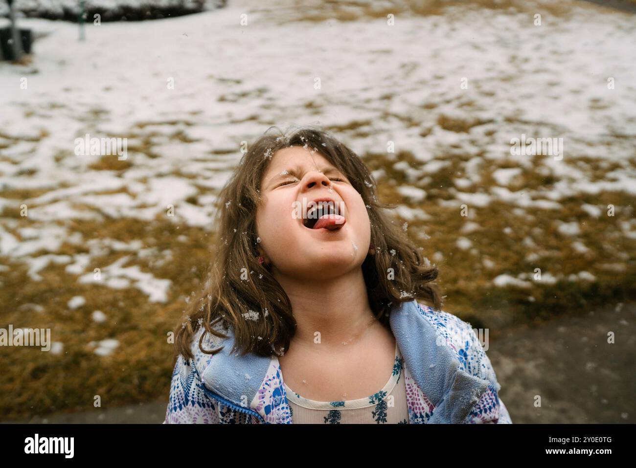 Girl catching snowflakes tongue hi-res stock photography and images - Alamy