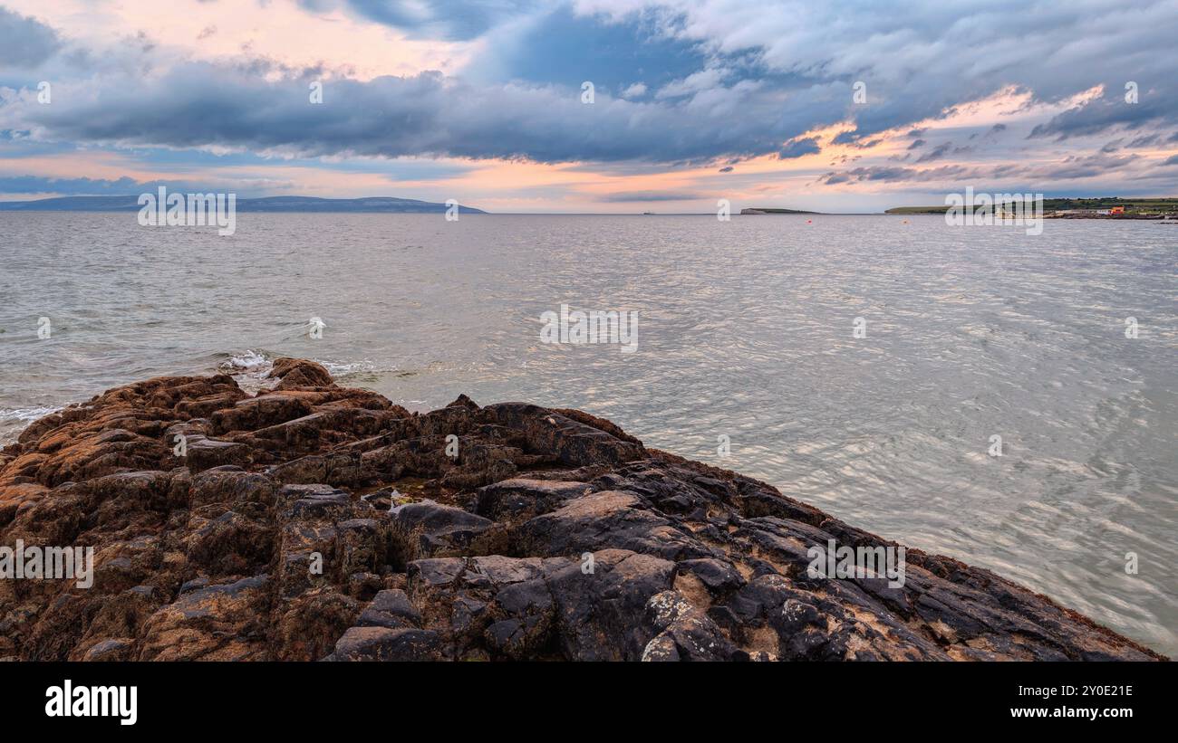 Dramatic cloudy coastal seascape sunset scenery, wild Atlantic way at ...