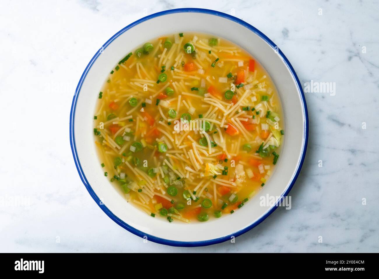 Vegetable soup with green beans and red pepper. Top view table with ...