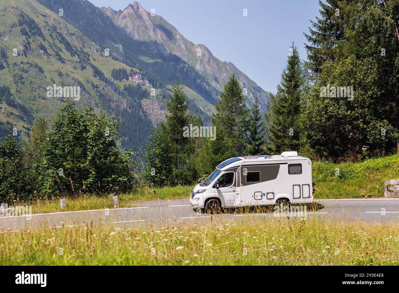 Scenic view big modern white family rv camper van vehicle drive Europe ...