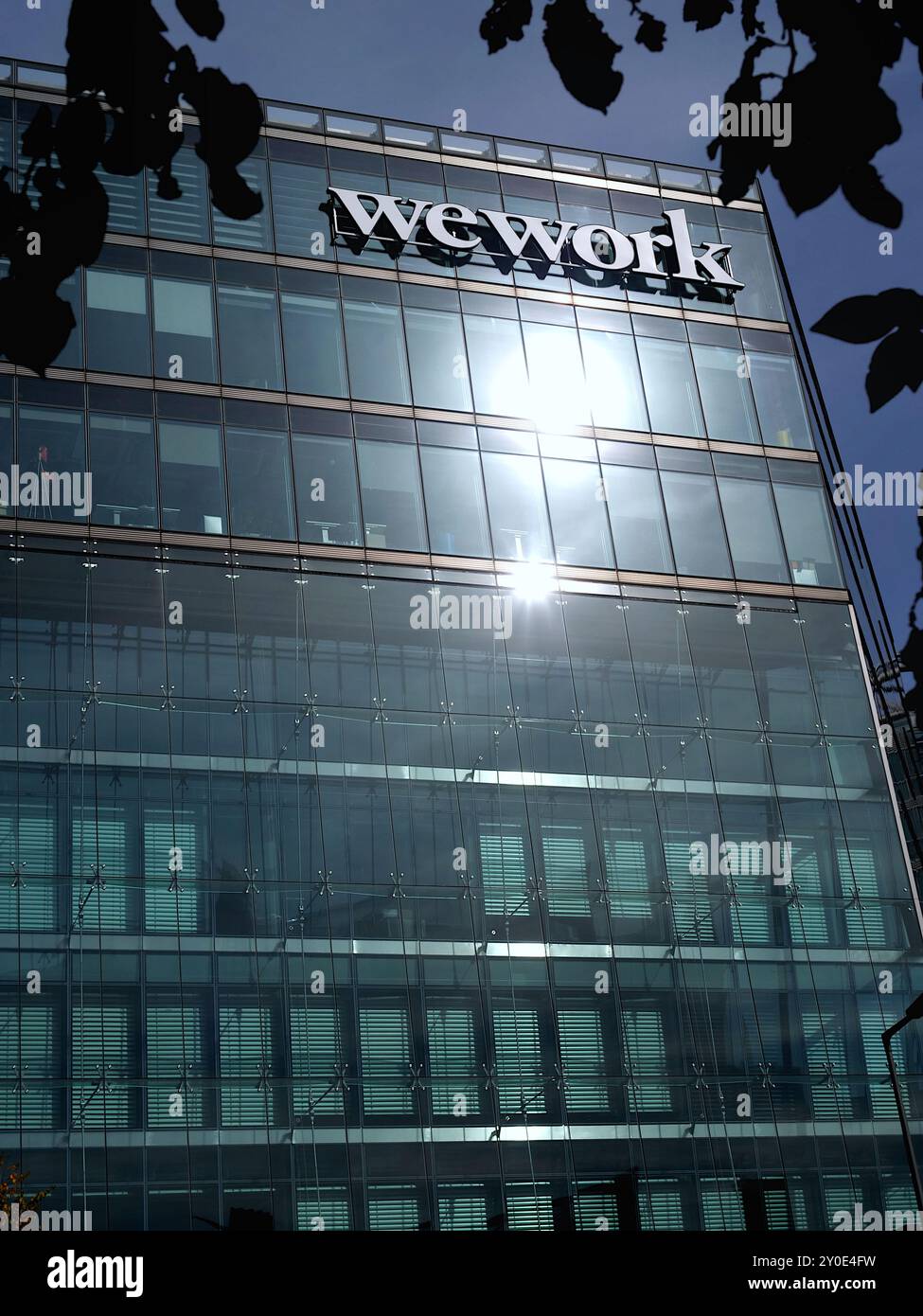 WeWork offices in Berlin, sun reflecting in glass facade, office ...