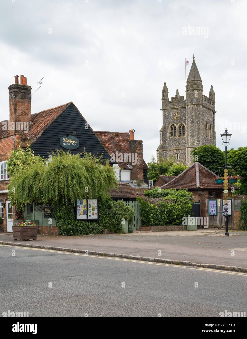 Street view of Market Square with St Mary the Virgin Church tower and ...