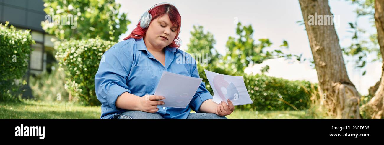 A plus size woman in colorful attire sits amidst lush greenery ...